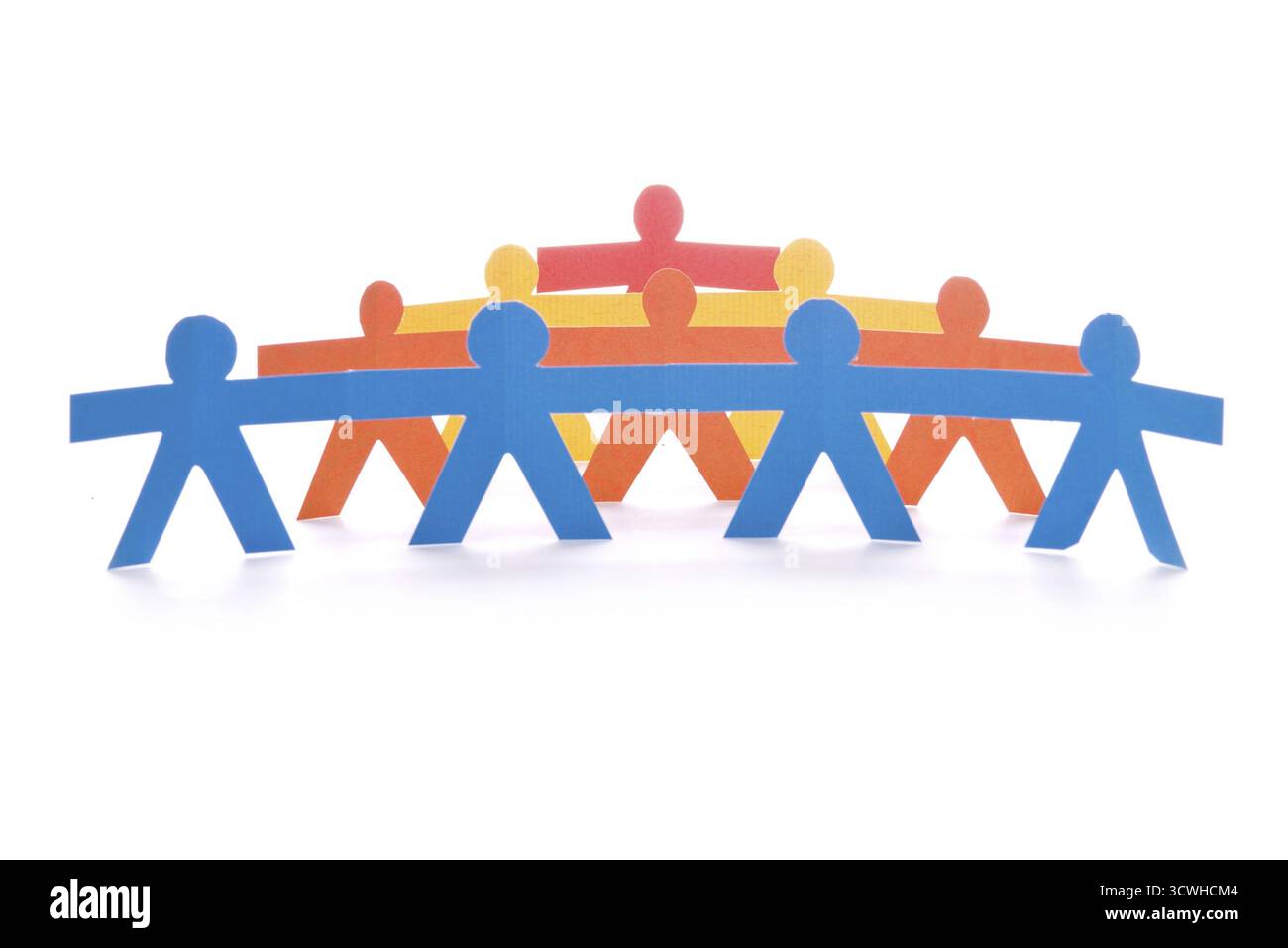 Concept of teamwork, colorful paper dolls chain on white background ...