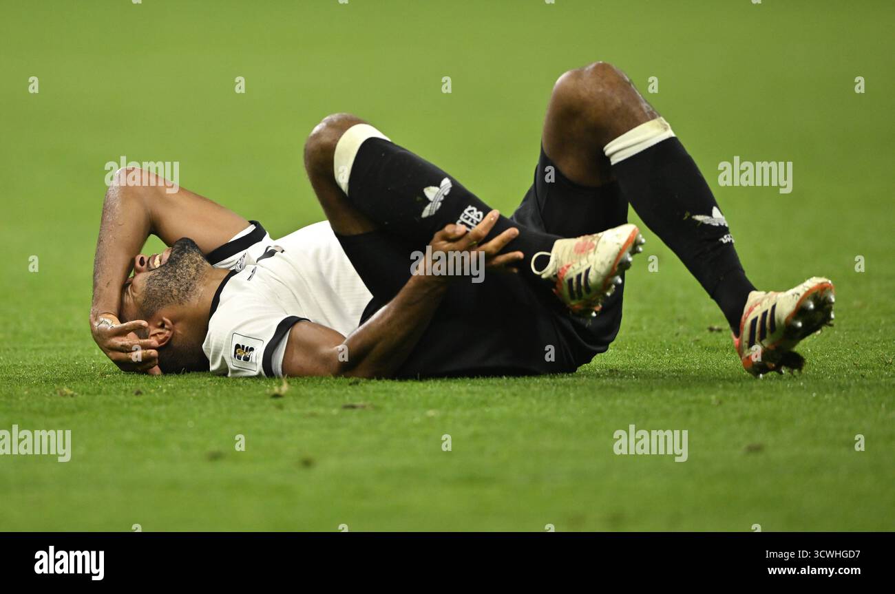 Jonathan Tah GER (04) injured on the ground Injury World Cup qualifier ...
