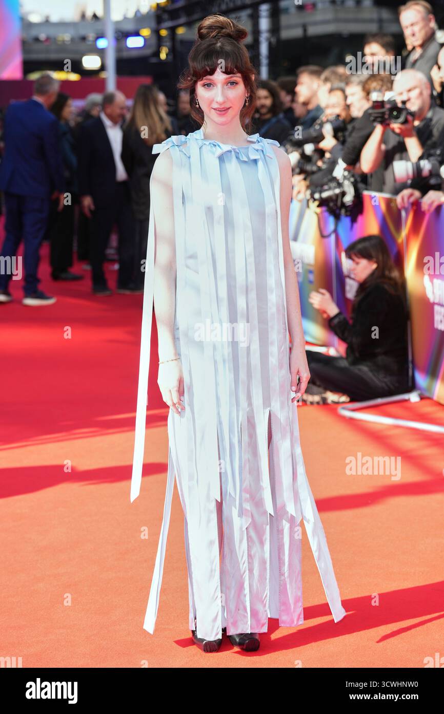 Emily Fairn poses for photographers upon arrival at the premiere of the ...