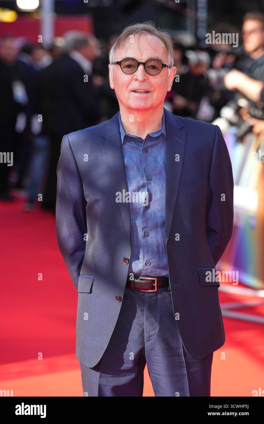 Ron Cook poses for photographers upon arrival at the premiere of the ...