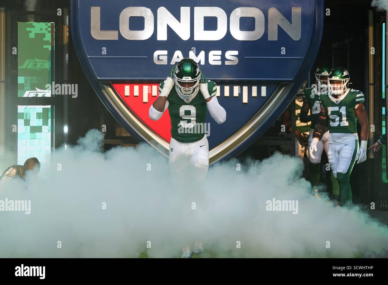 New York Jets defensive end Will McDonald IV (9) runs onto the field ...
