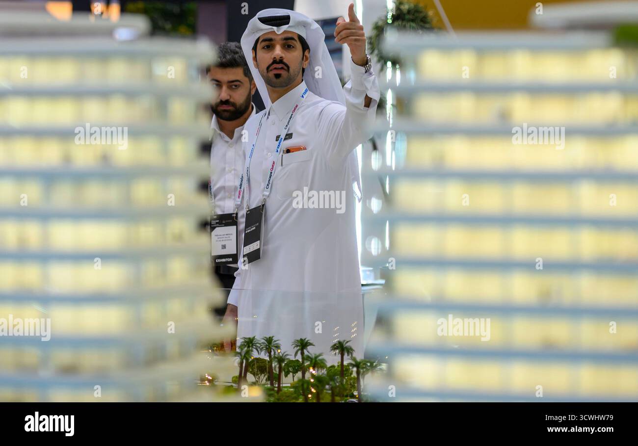 CITYSCAPE QATAR 2025Õ THE REAL ESTATE EXHIBITION IN DOHA A man visits ...