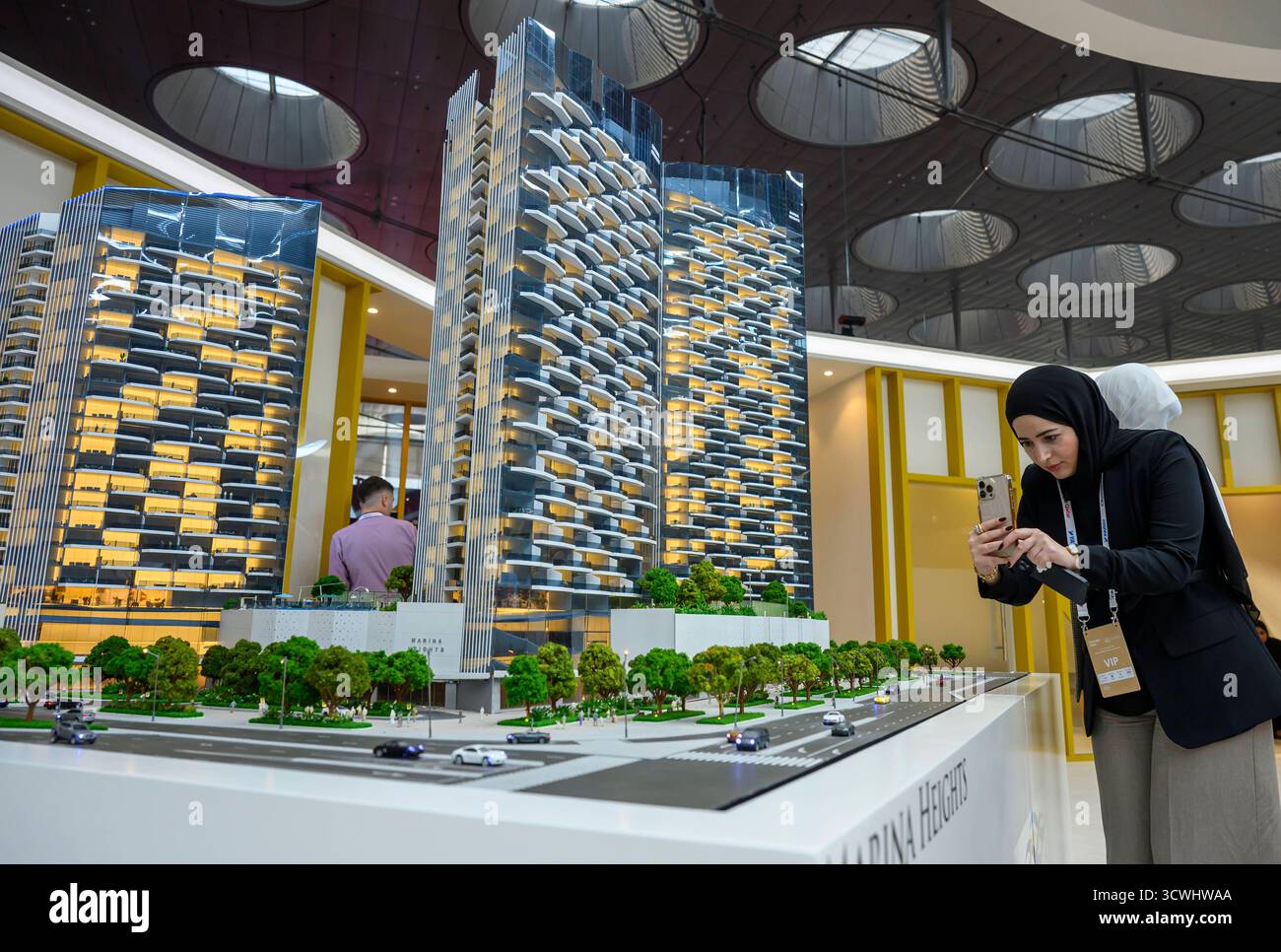 CITYSCAPE QATAR 2025Õ THE REAL ESTATE EXHIBITION IN DOHA A visitor ...