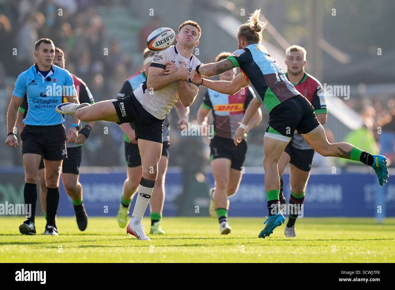 Harlequins' Tyrone Green (second from right) and Saracens' Fergus Burke ...