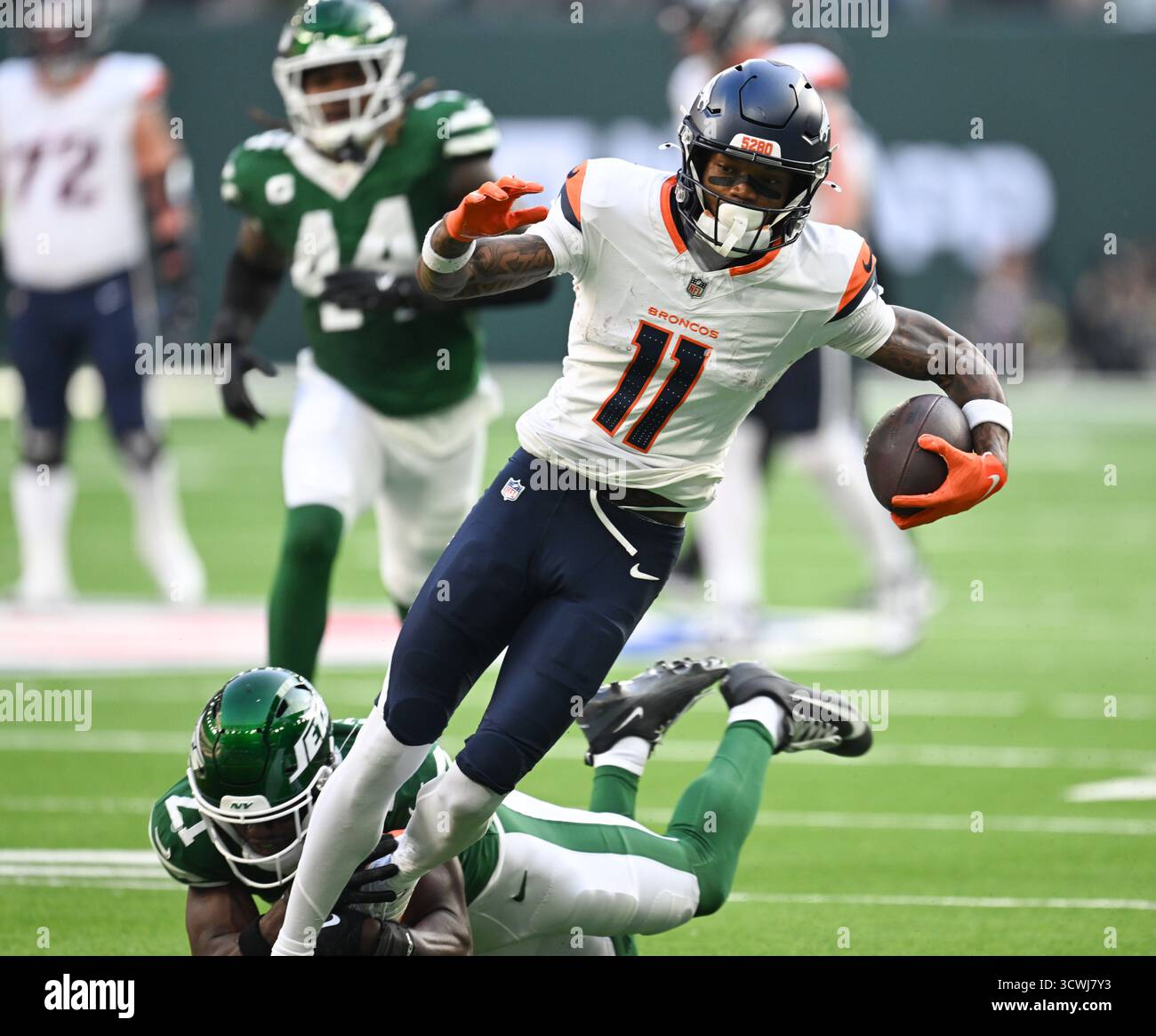 Denver Broncos #11 Troy Franklin tackled by New York Jets #27 Malachi ...