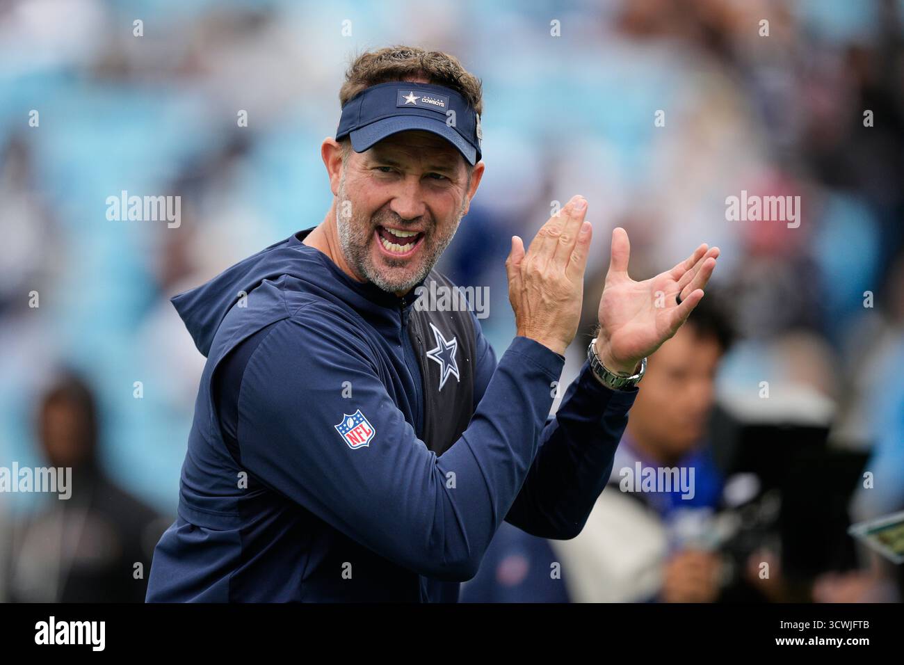 Dallas Cowboys head coach Brian Schottenheimer watches warmups before ...