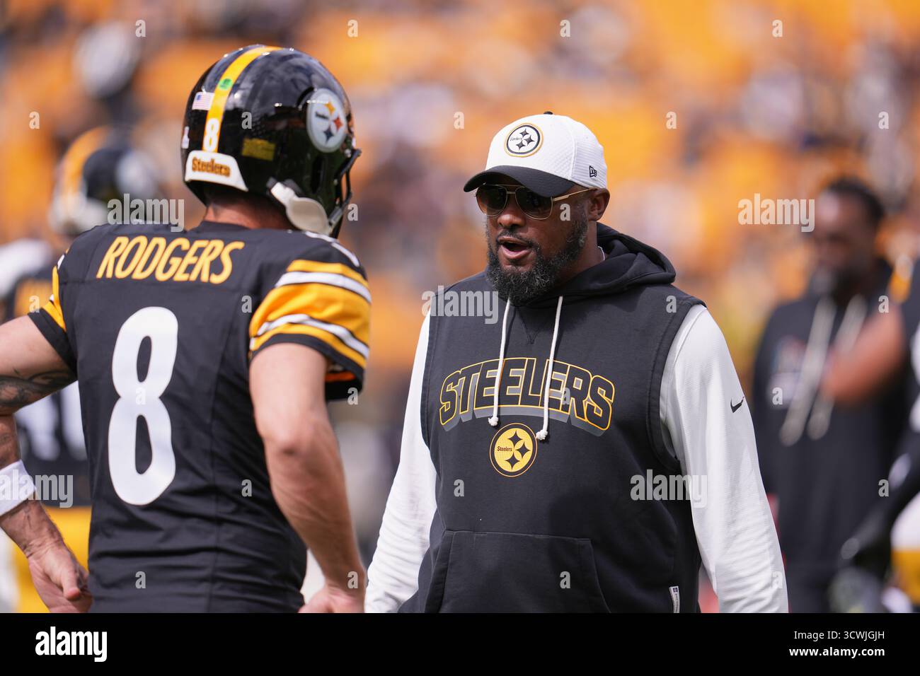 Pittsburgh Steelers quarterback Aaron Rodgers (8) talks with head coach ...