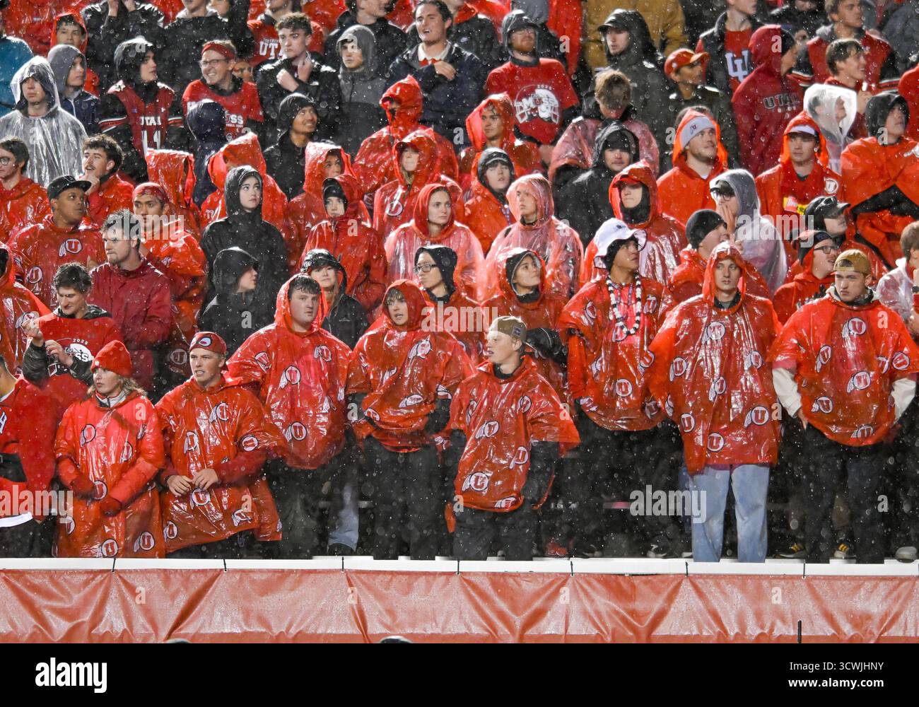 SALT LAKE CITY, UT - OCTOBER 11: Utah fans dress for the rain during a ...