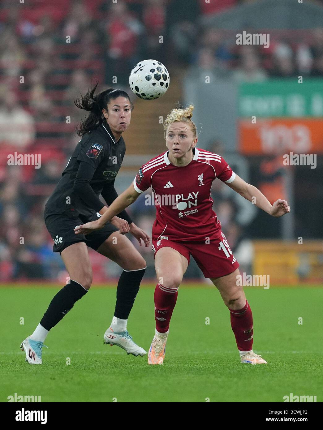 Manchester City's Kerstin Casparij and Liverpool's Sofie Lundgaard ...