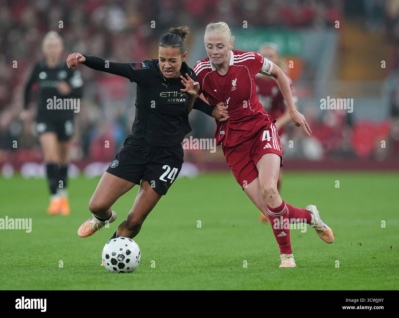 Manchester City's Iman Beney battles for the ball with Liverpool's ...