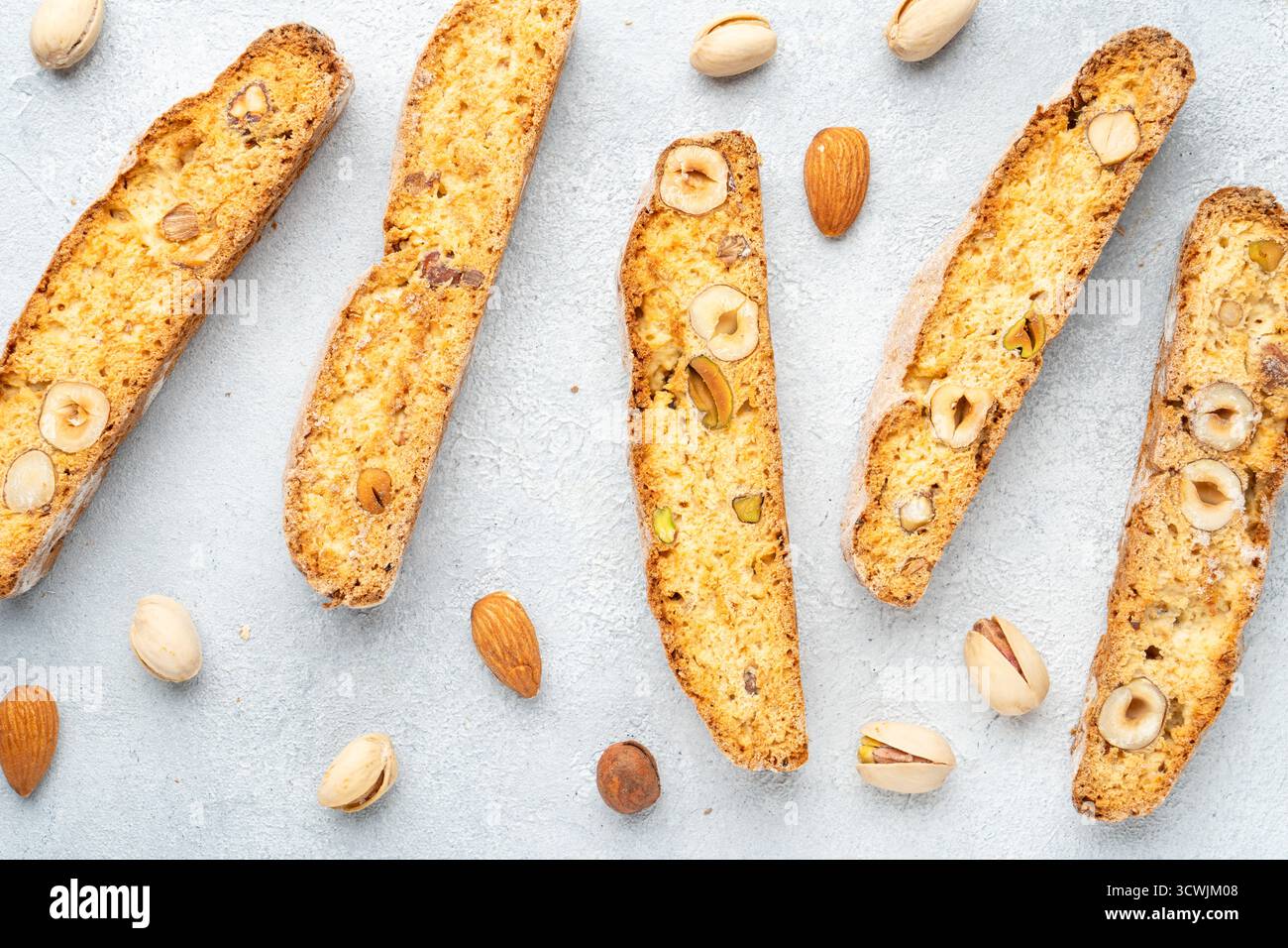 Biscotti, traditional italian bakery with nuts mix. Top view on white ...