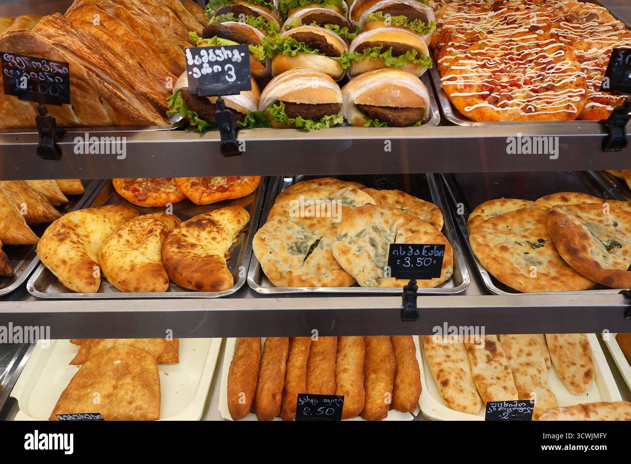 Display of fast food snacks in Tbilisi, Georgia Stock Photo - Alamy
