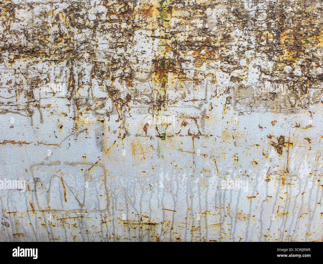 Wet gray painted steel with glue marks, vertical surface, full-frame ...