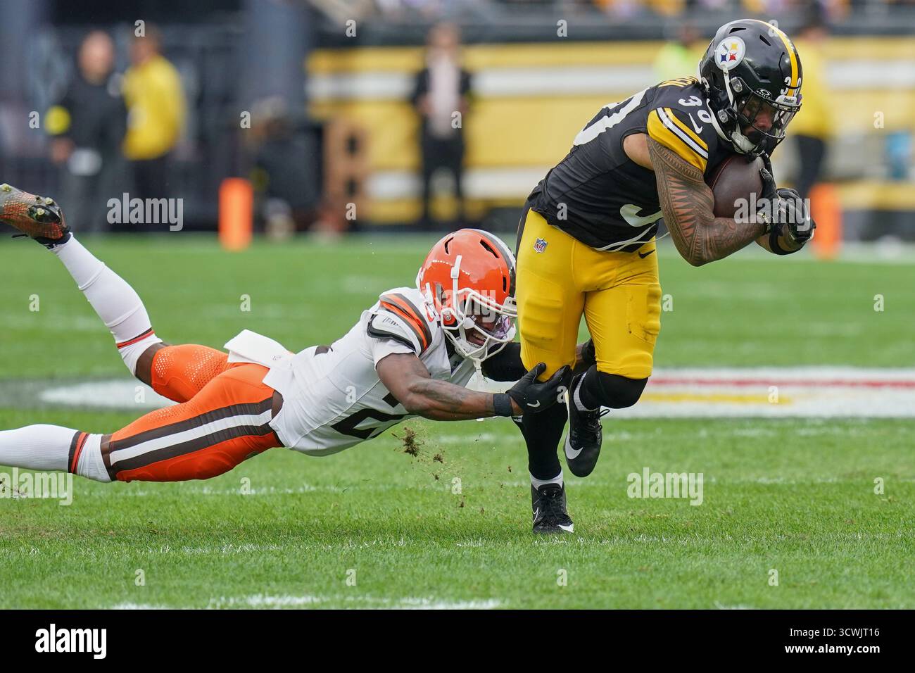 Cleveland Browns cornerback Denzel Ward, left, tackled Pittsburgh ...