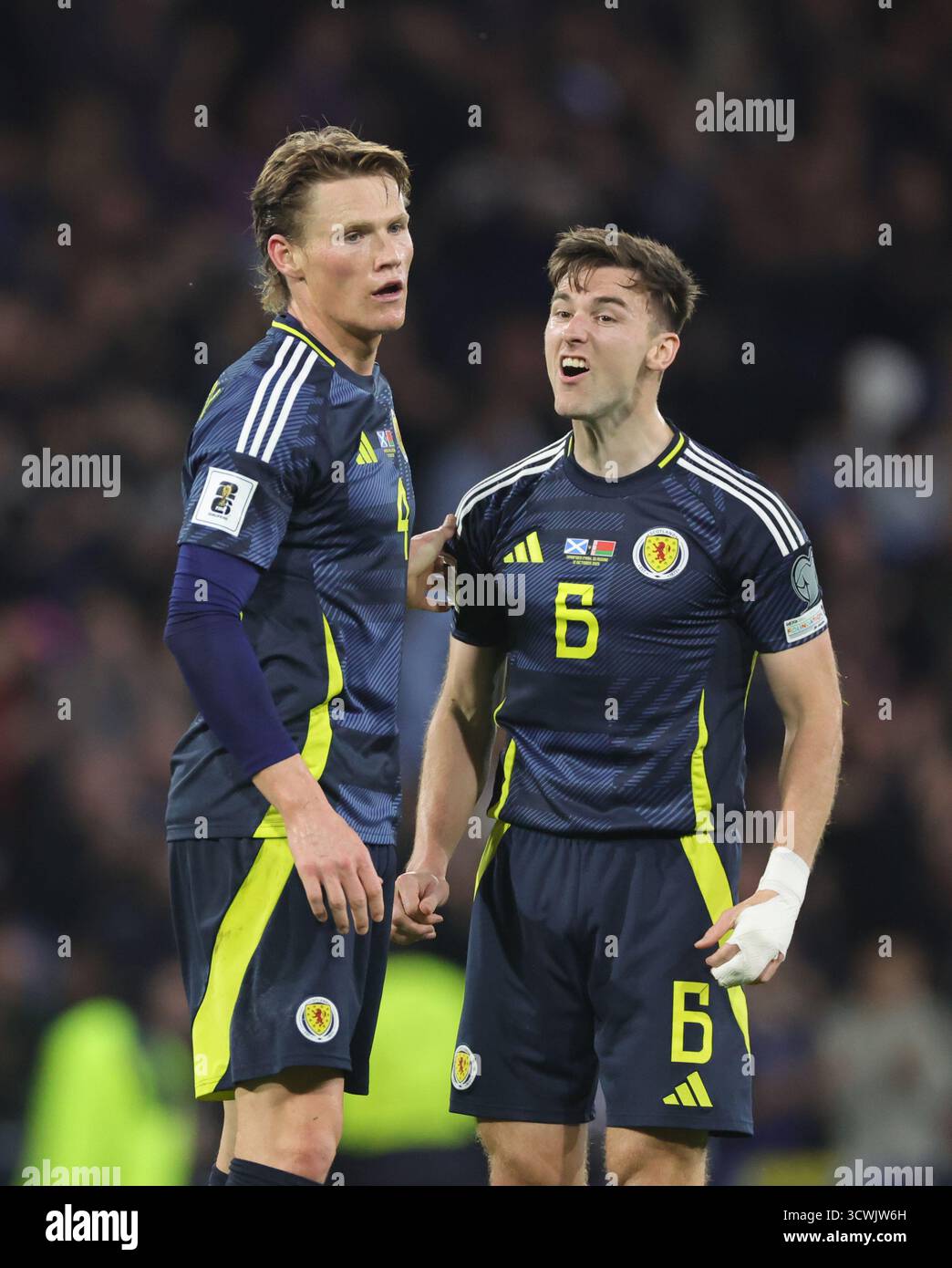 Scotland's Scott McTominay (left) celebrates scoring their side's ...