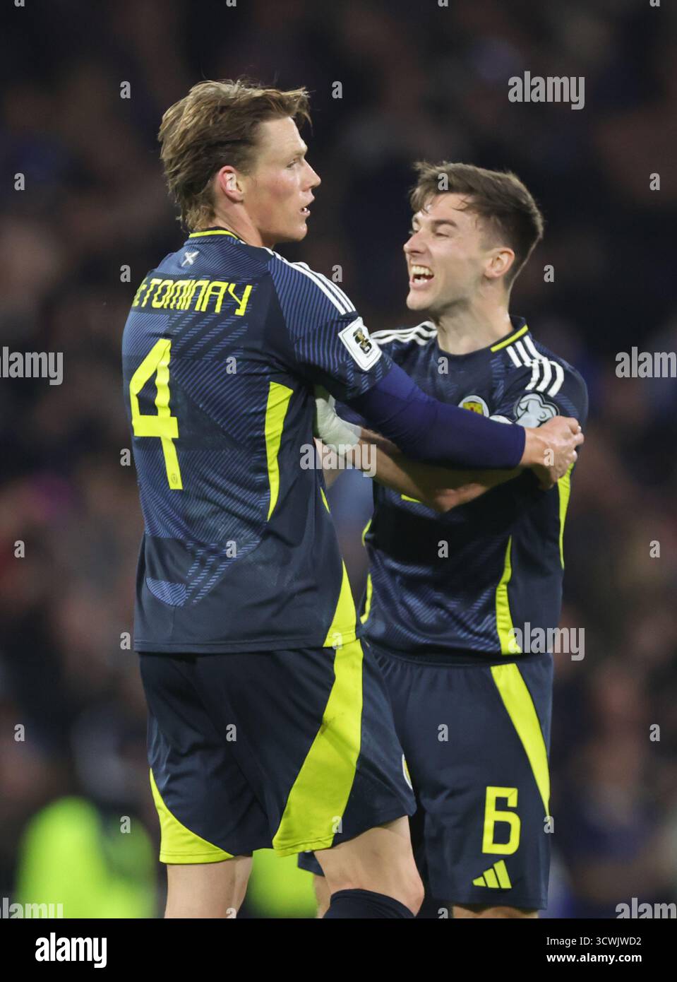Scotland's Scott McTominay (left) celebrates scoring their side's ...