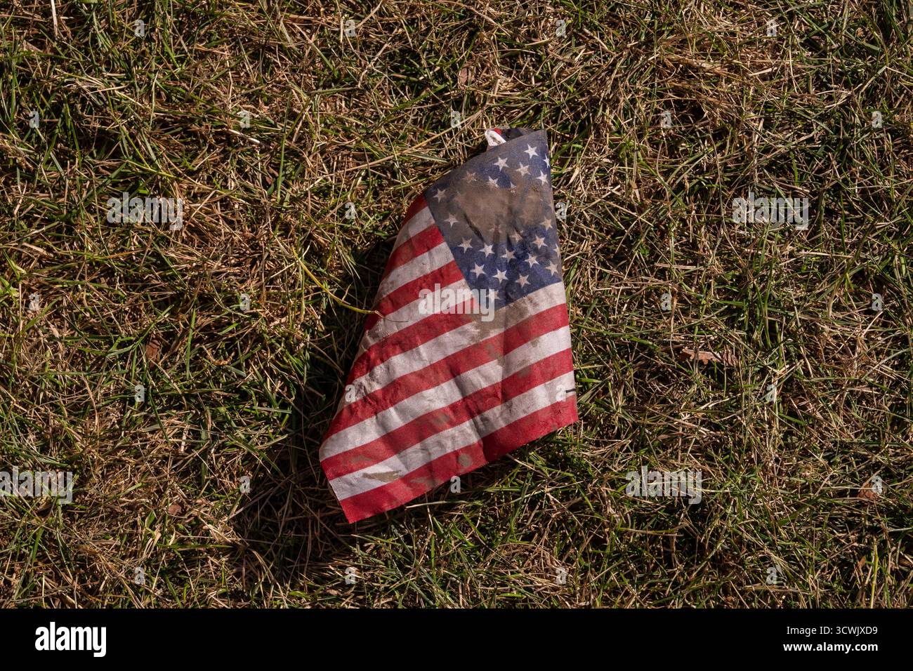 A flag of the United States lays on the floor outside the U.S ...