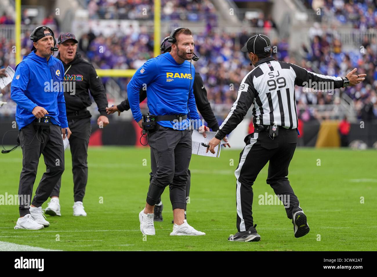 Los Angeles Rams head coach Sean McVay, center, talks to side judge Lo ...