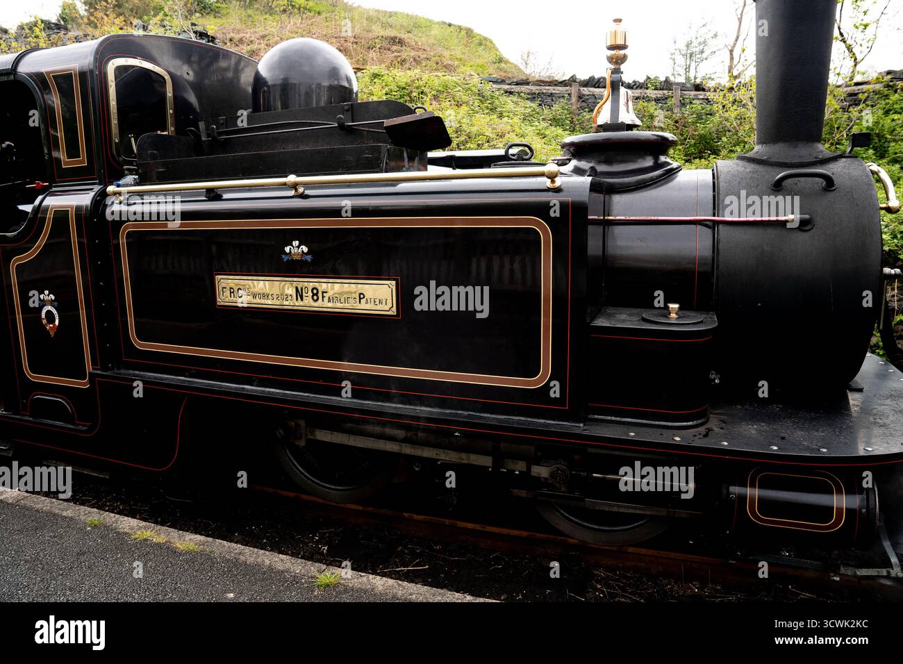 Vintage steam locomotive with brass nameplate at heritage railway ...