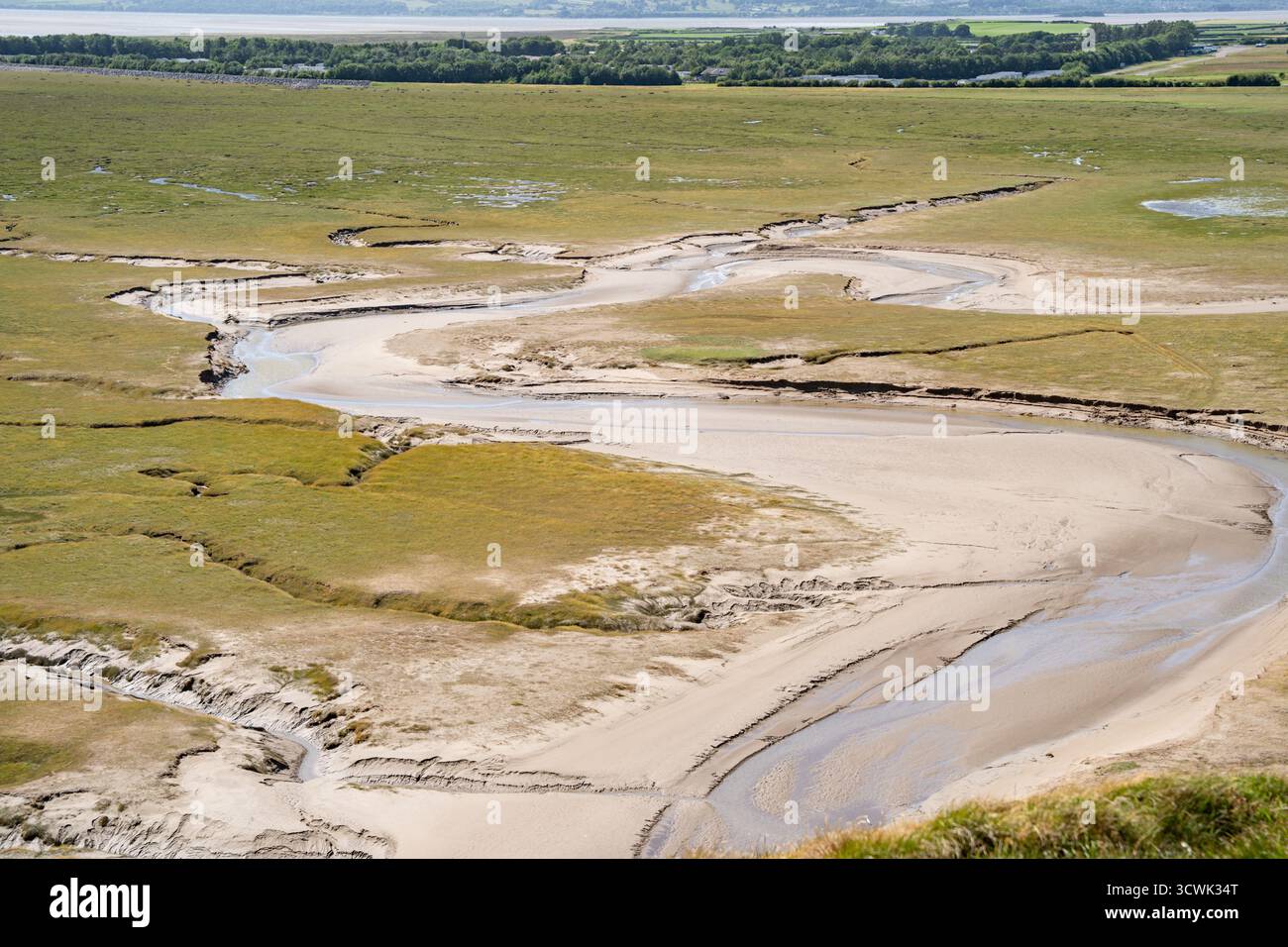 Aerial view of tidal channels and salt marsh at Humphrey Head, Cumbria ...