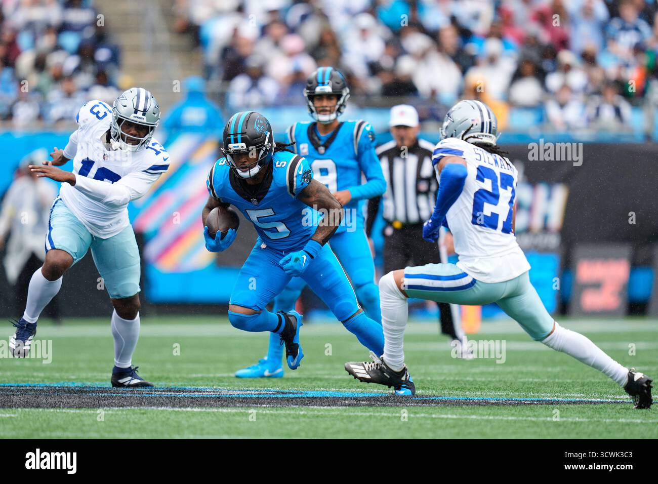 Carolina Panthers running back Rico Dowdle (5) runs the ball as Dallas ...