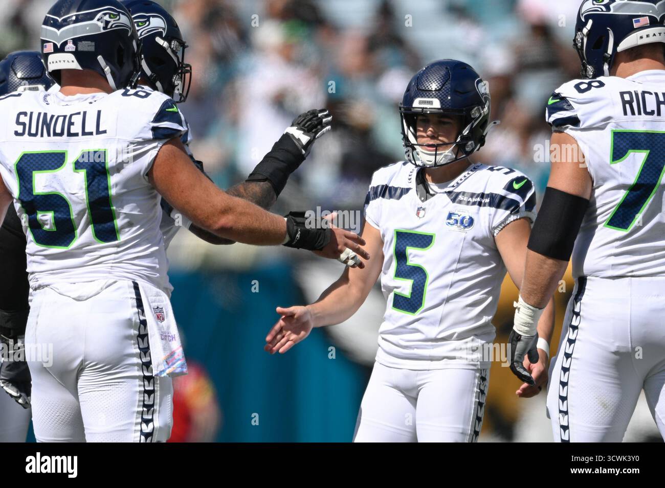 Seattle Seahawks kicker Jason Myers (5) is congratulated after kicking ...