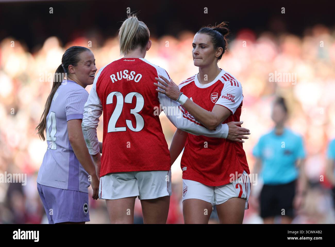 London, UK. 12th Oct, 2025. Emily Fox, of Arsenal Women, hugs Alessia ...
