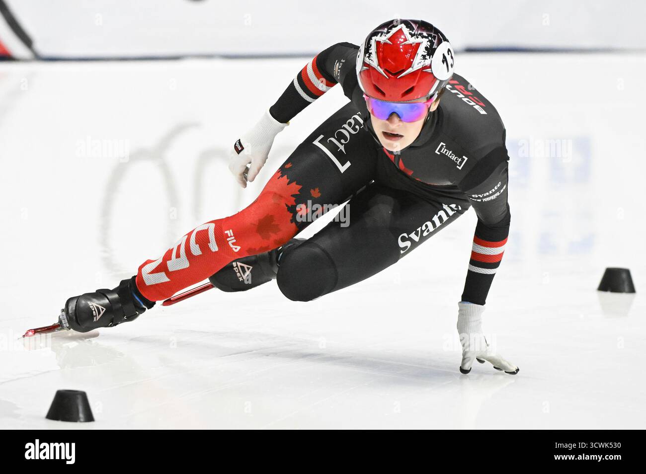 Kim Boutin, of Canada, takes a turn during the 500m quarterfinal race ...