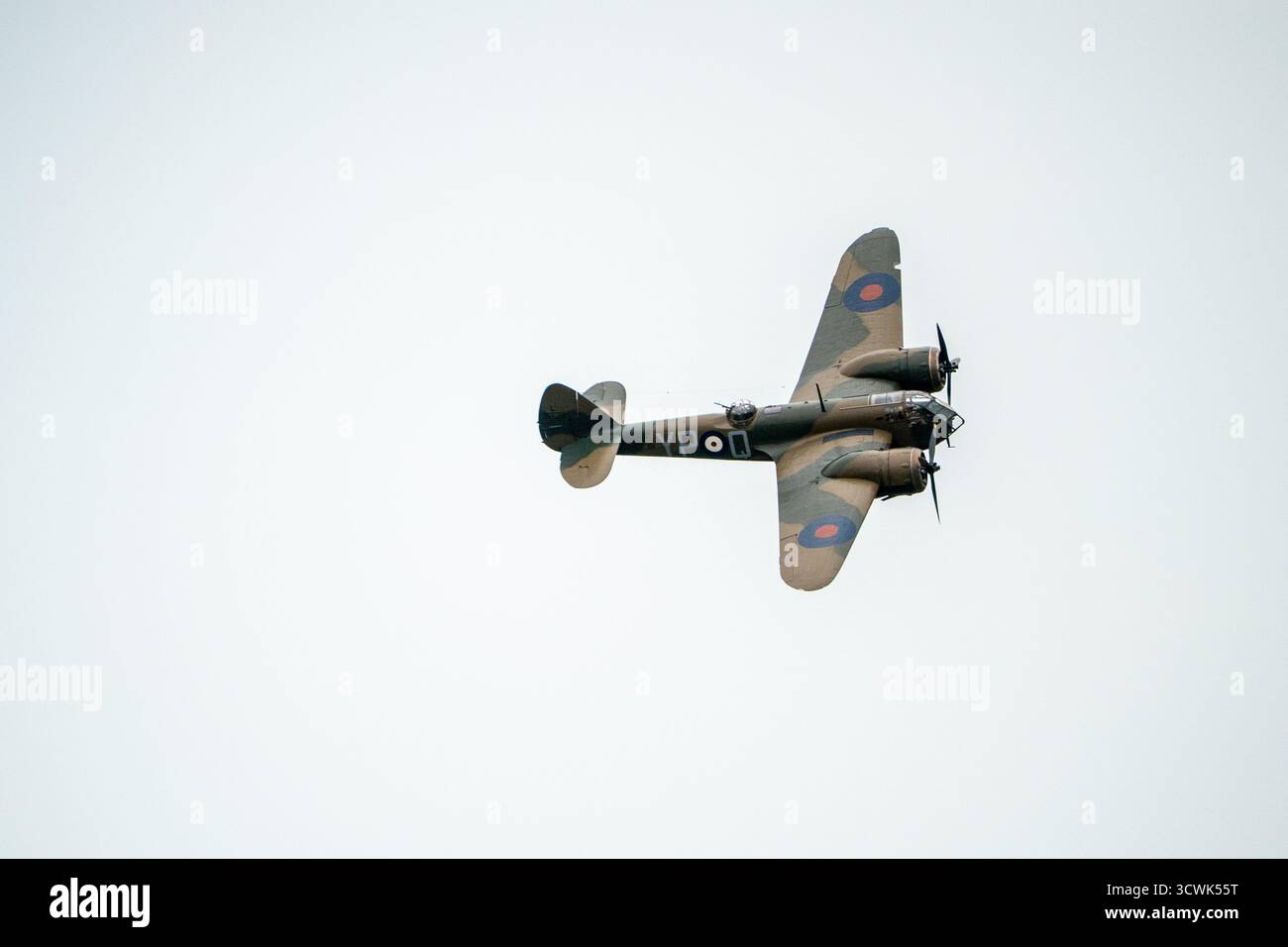 RAF Bristol Beaufighter twin-engine aircraft in flight against overcast ...