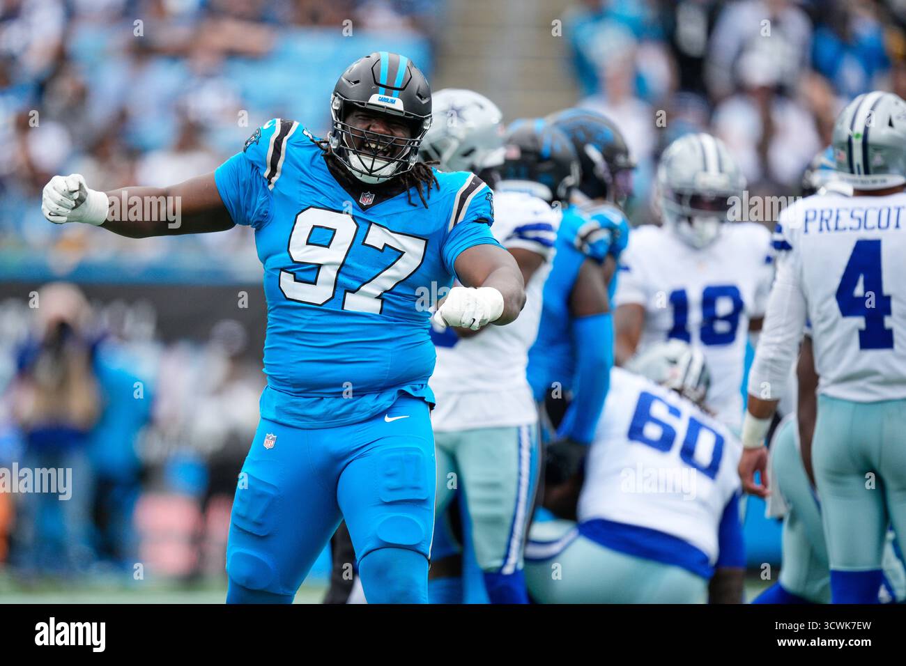 Carolina Panthers defensive tackle Bobby Brown III (97) celebrates a ...