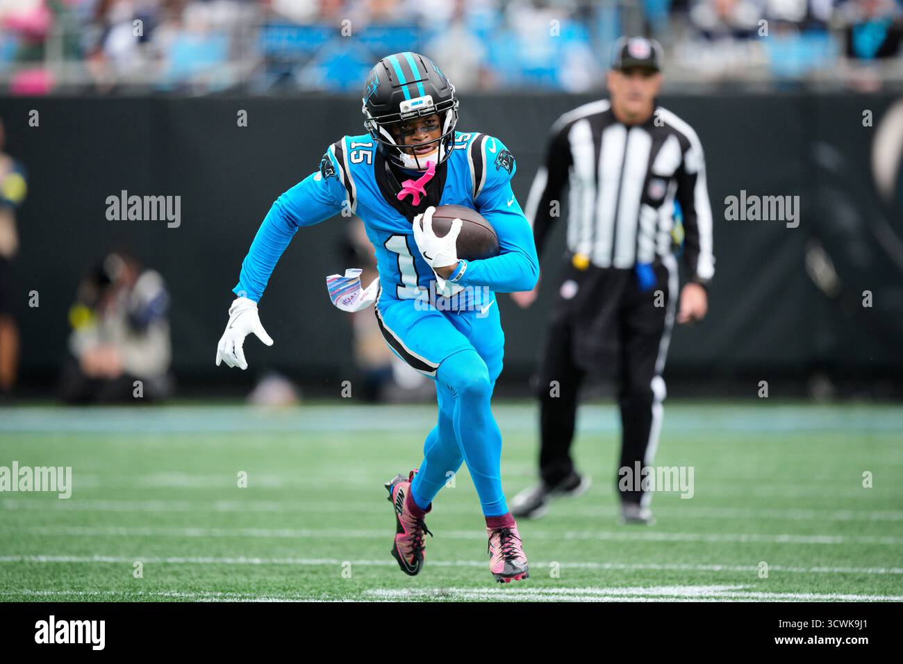 Carolina Panthers wide receiver Jimmy Horn Jr. (15) gains yards after a ...