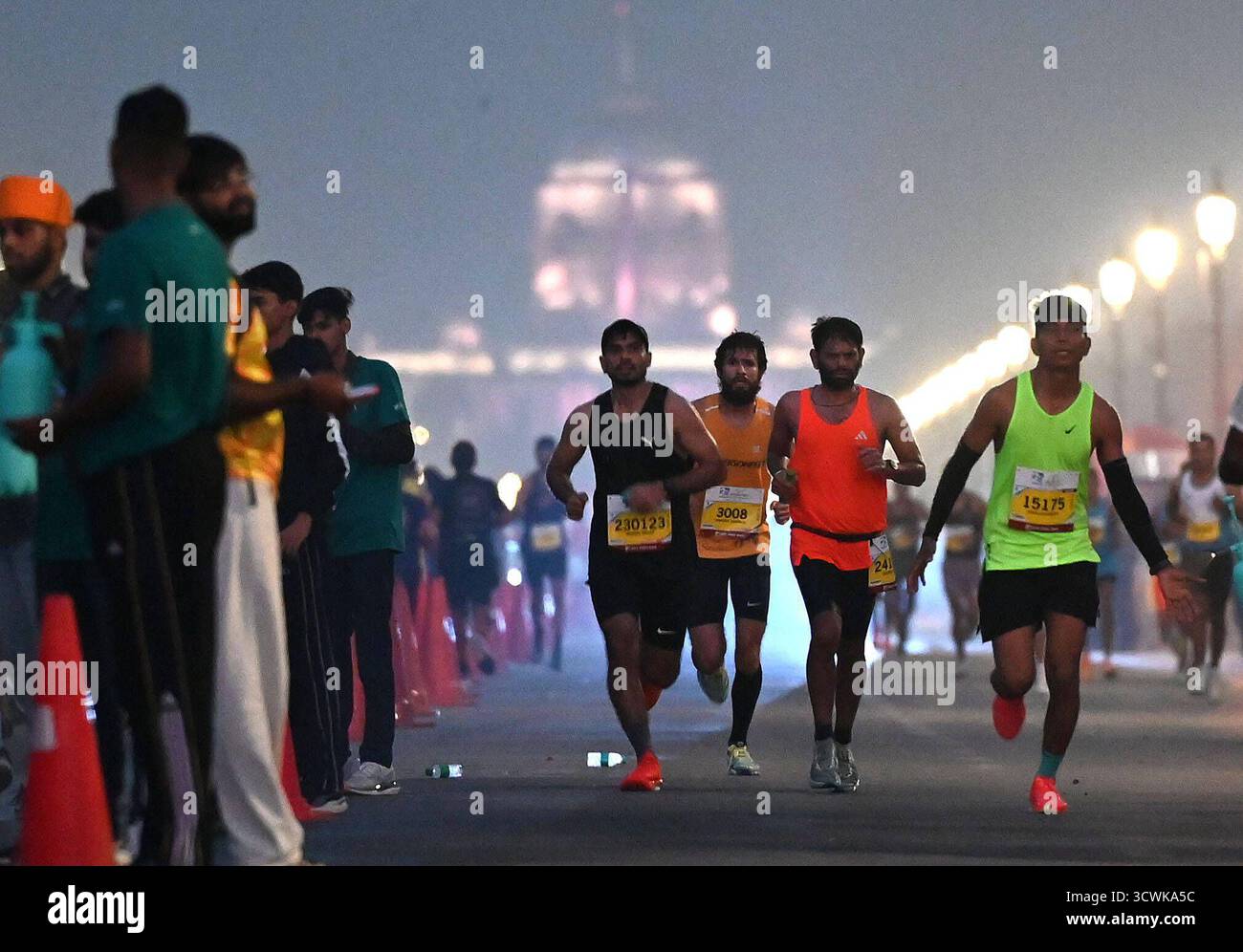 NEW DELHI, INDIA - OCTOBER 12: Participants take part in the Vedanta Delhi Half Marathon 2025 at ...
