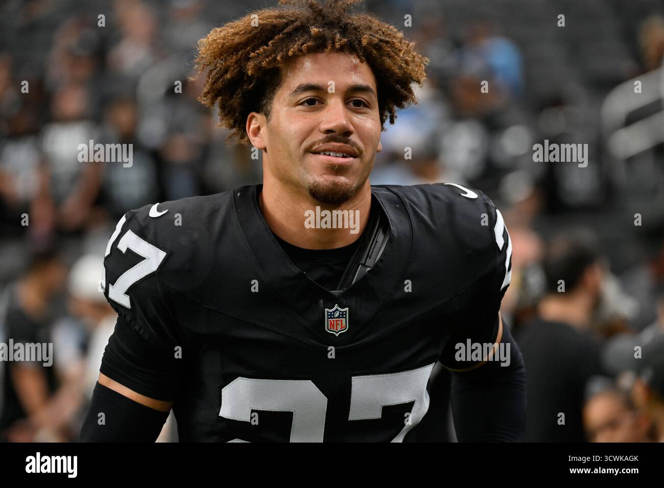 Las Vegas Raiders safety Tristin McCollum (27) warms up before an NFL ...