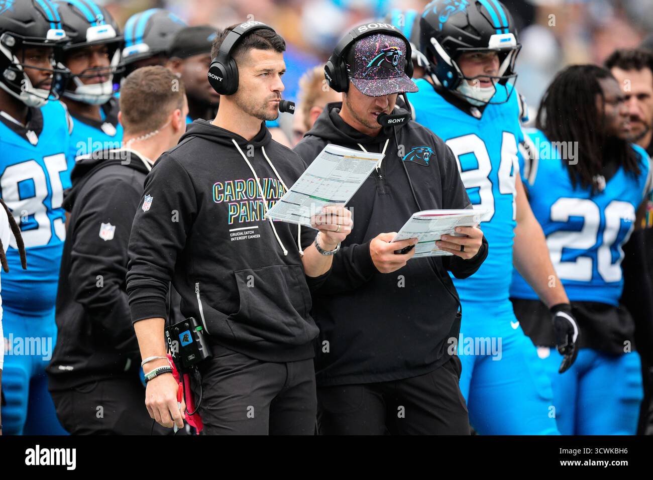 Carolina Panthers head coach Dave Canales, center left, watches play ...