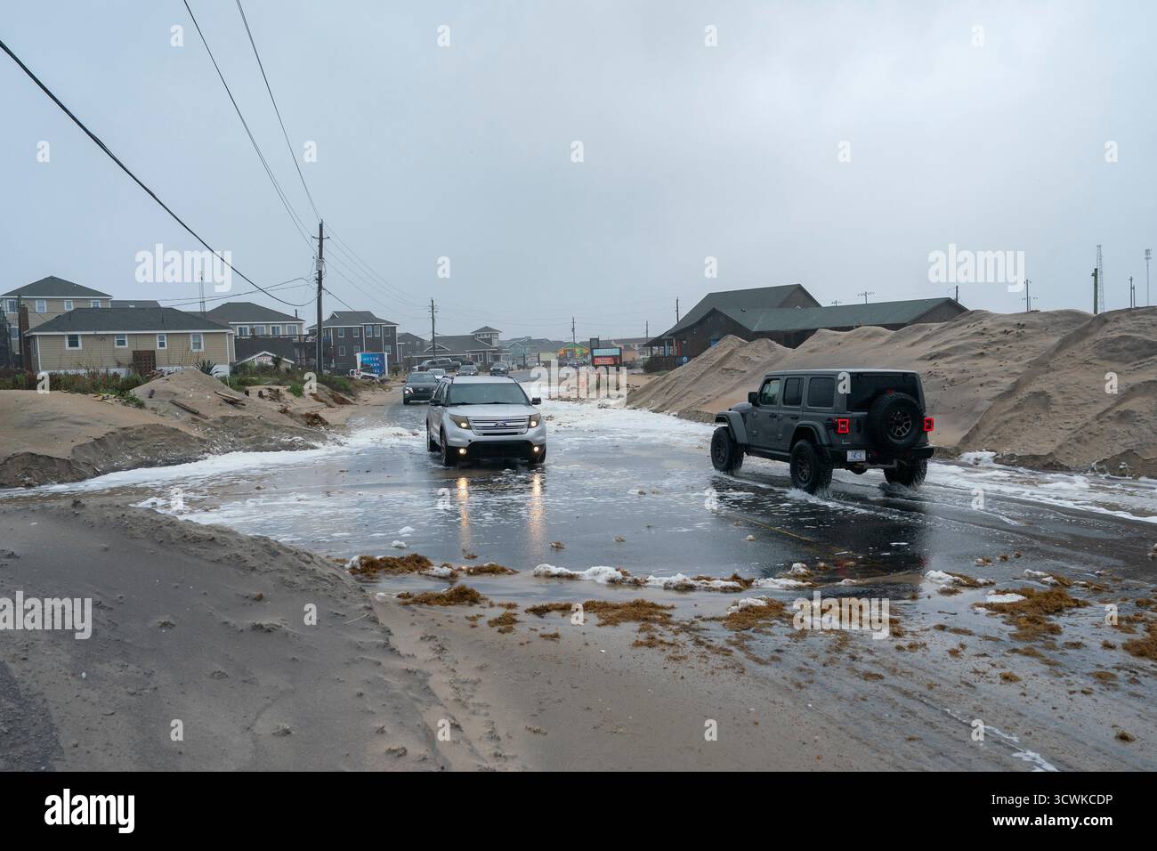Highway 12 is flooded in the midst of a storm, Sunday, Oct. 12, 2025 ...