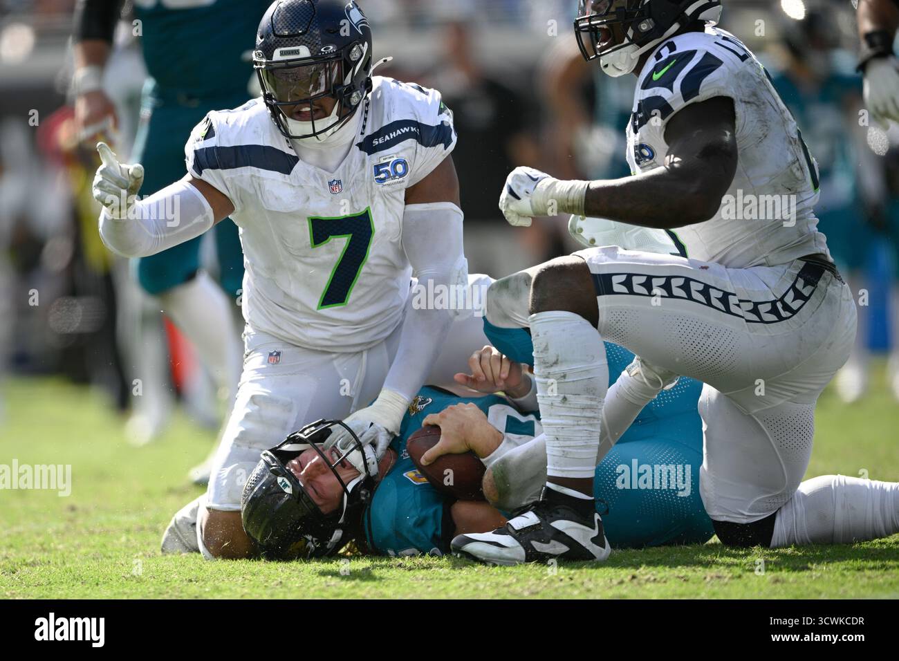 Seattle Seahawks linebacker Uchenna Nwosu (7) celebrates after sacking ...