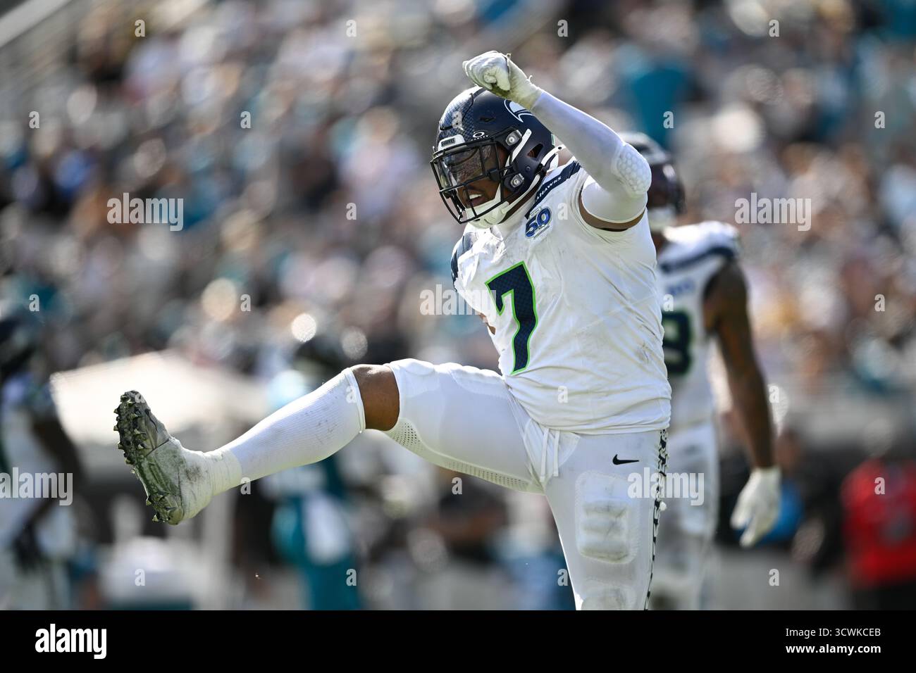 Seattle Seahawks linebacker Uchenna Nwosu (7) celebrates after sacking ...