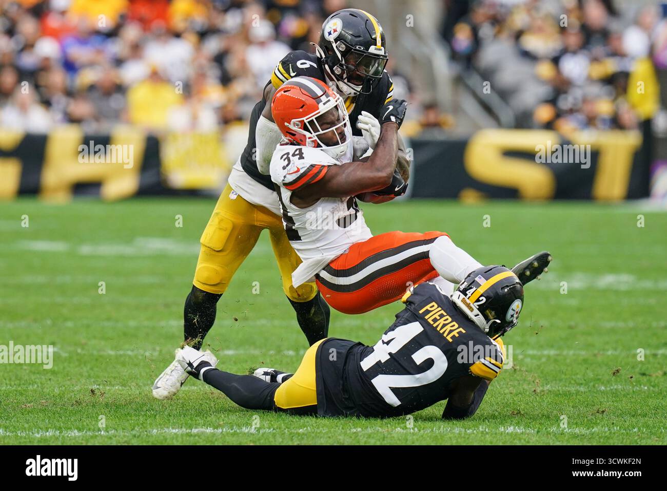 Cleveland Browns running back Jerome Ford (34) is tackled by Pittsburgh ...