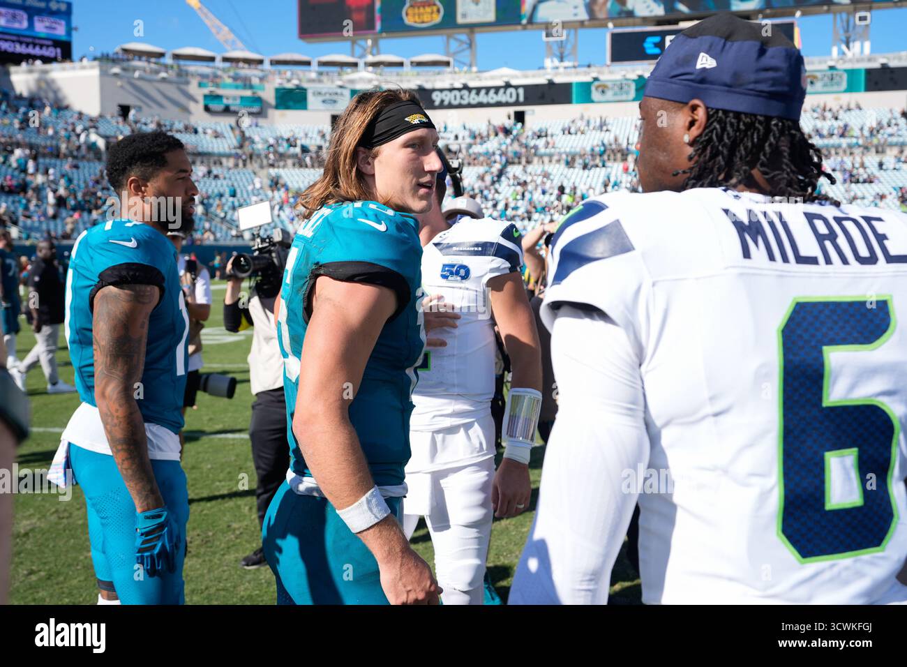 Jacksonville Jaguars quarterback Trevor Lawrence greets Seattle ...