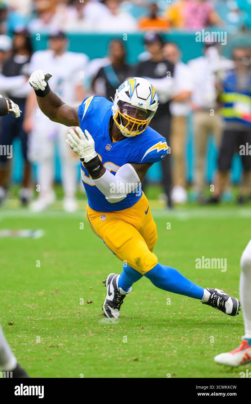 Los Angeles Chargers linebacker Odafe Oweh (98) rushes Miami Dolphins ...