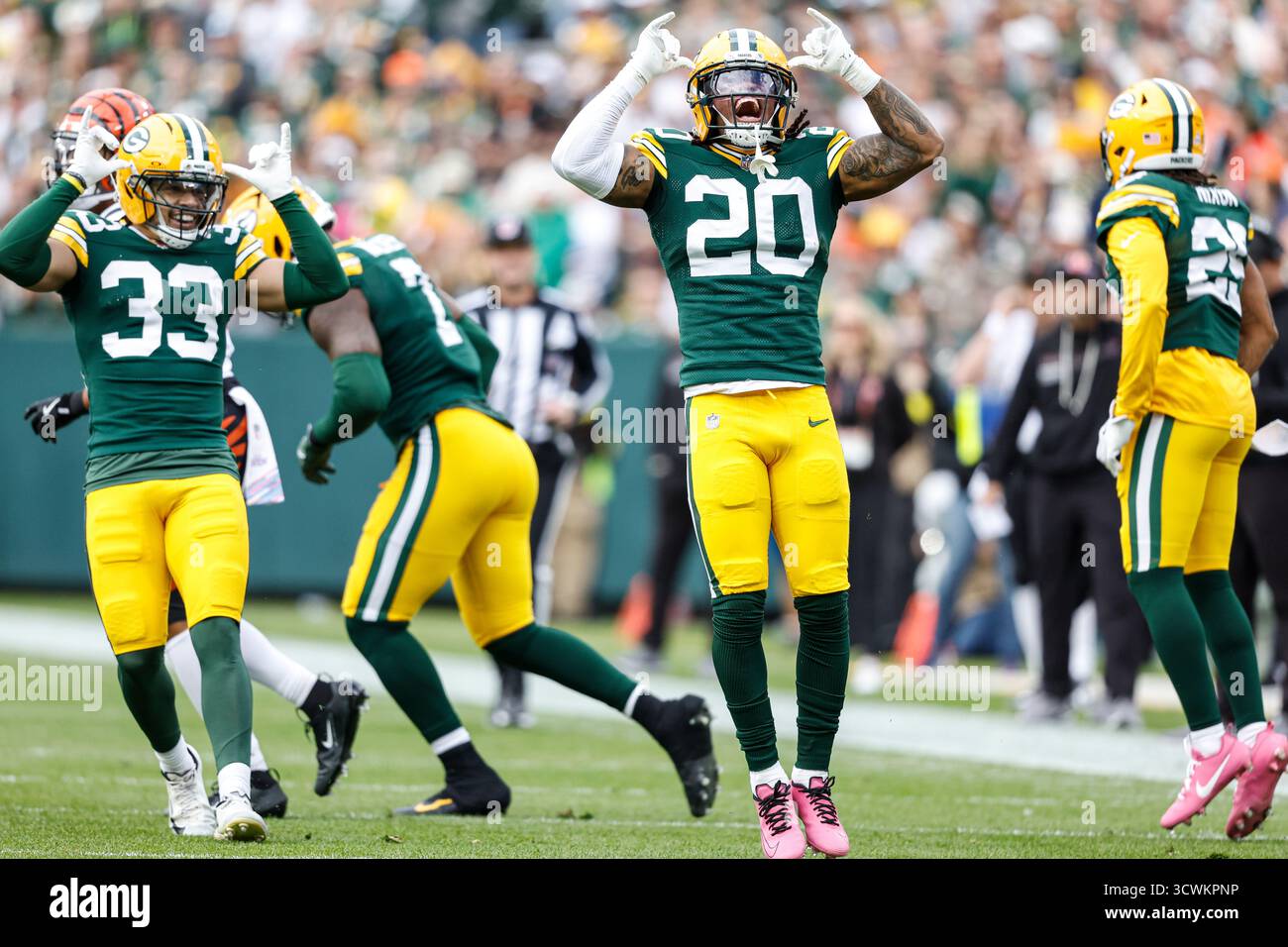 Green Bay Packers safety Evan Williams (33) and Green Bay Packers ...