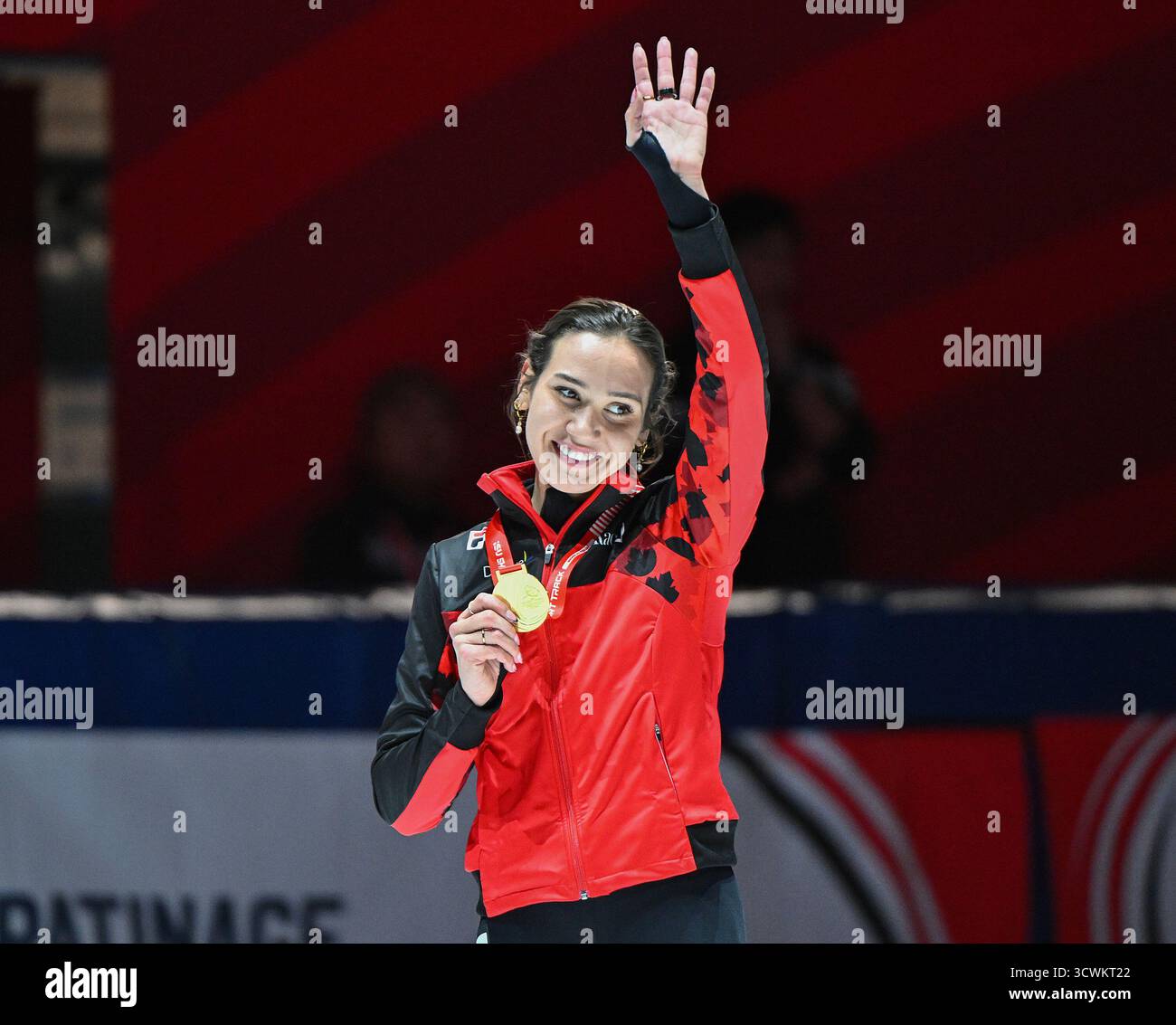 Courtney Sarault, of Canada, waves to fans after winning the 1500m ...