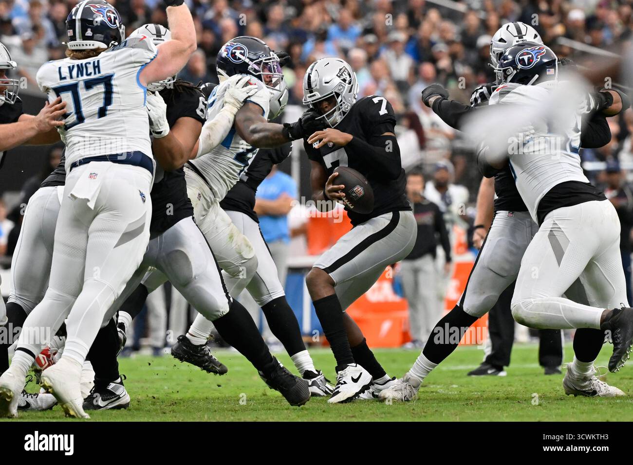 Tennessee Titans linebacker Dre'Mont Jones (45) grabs the face mask of ...