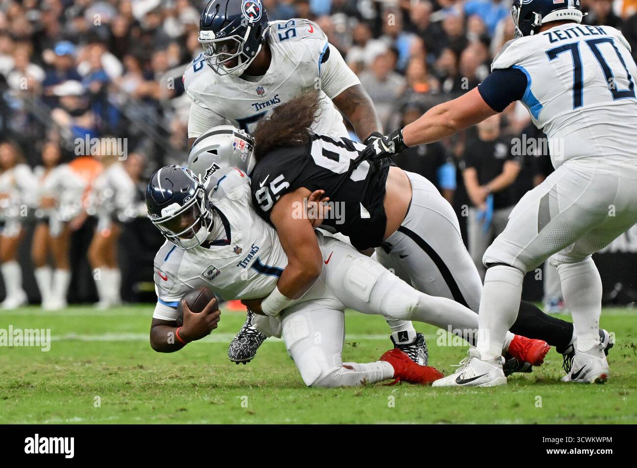 Las Vegas Raiders defensive tackle Leki Fotu (95) sacks Tennessee ...