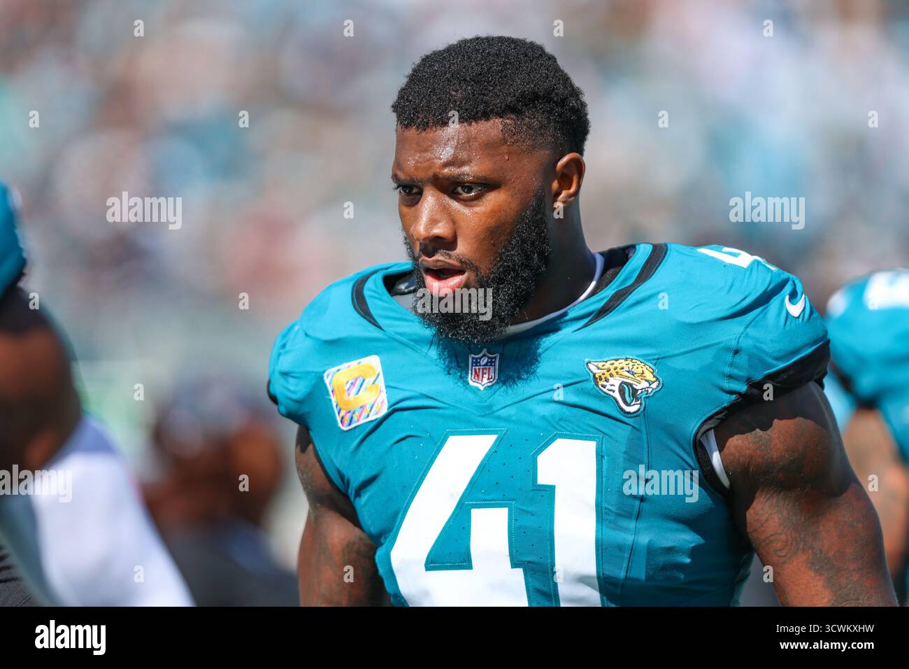Jacksonville Jaguars defensive end Josh Hines-Allen (41) walks the ...