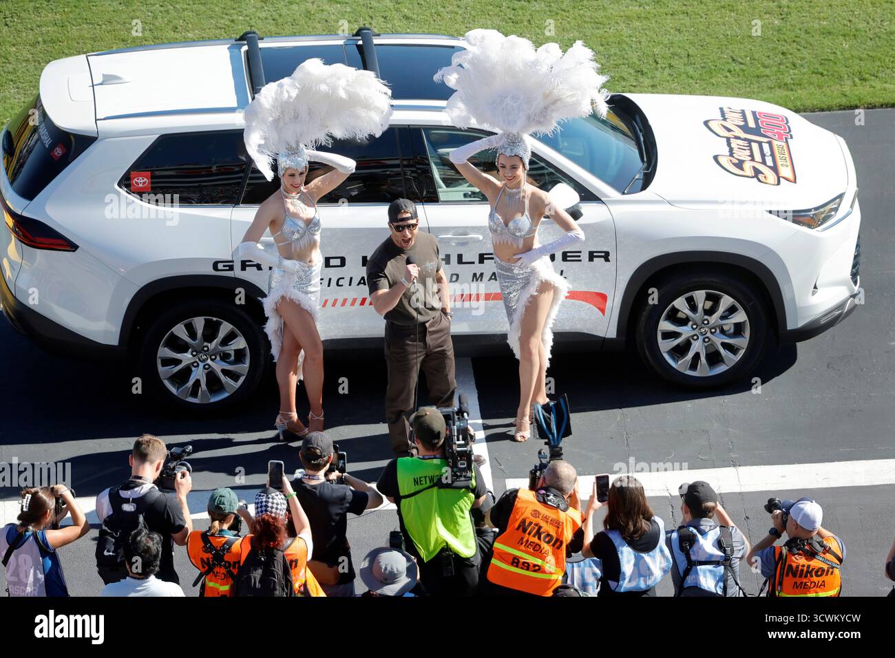 Actor Glenn Powell, center top, serving as race grand marshal ...