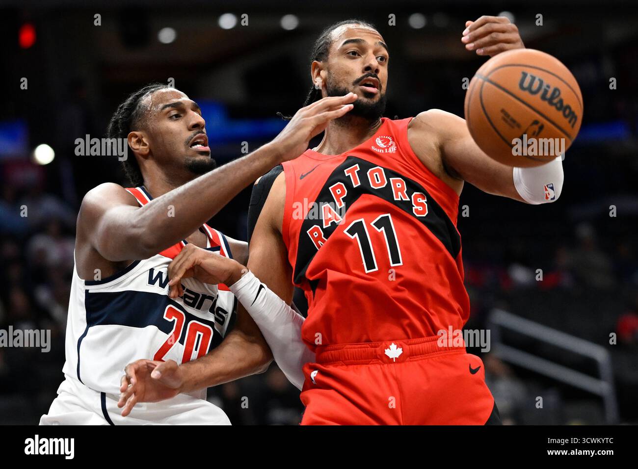 Washington Wizards center Alex Sarr (20) and Toronto Raptors center ...