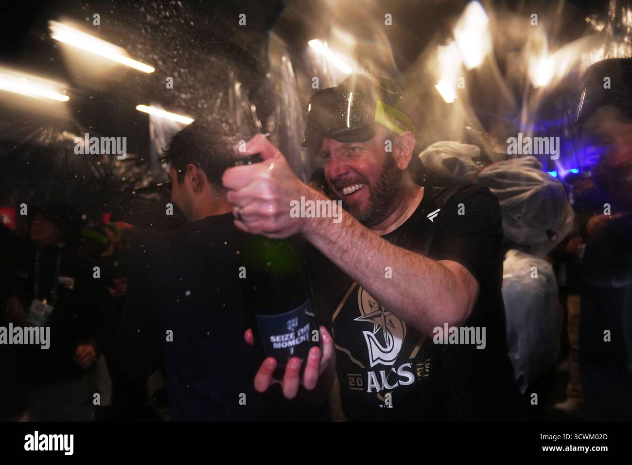 Seattle Mariners general manager Justin Hollander celebrates his team's ...