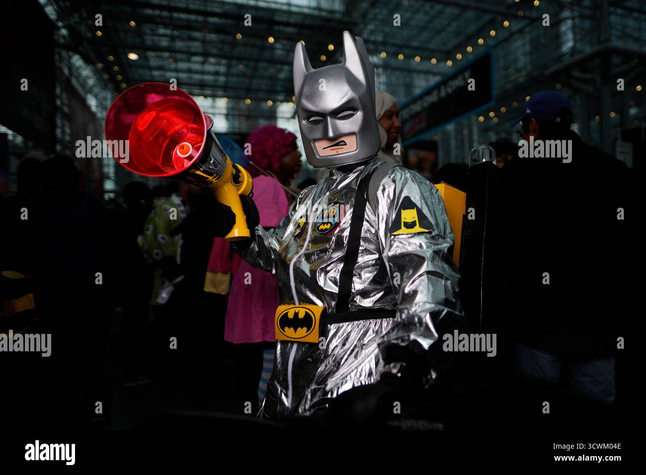 An attendee dressed as Lego Batman poses during New York Comic Con at ...