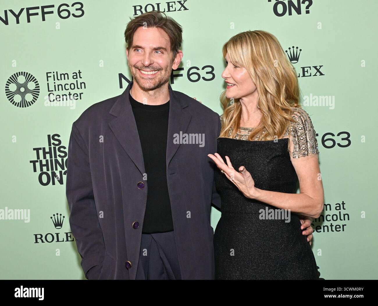 Bradley Cooper, left, and Laura Dern attend the premiere of "Is This ...